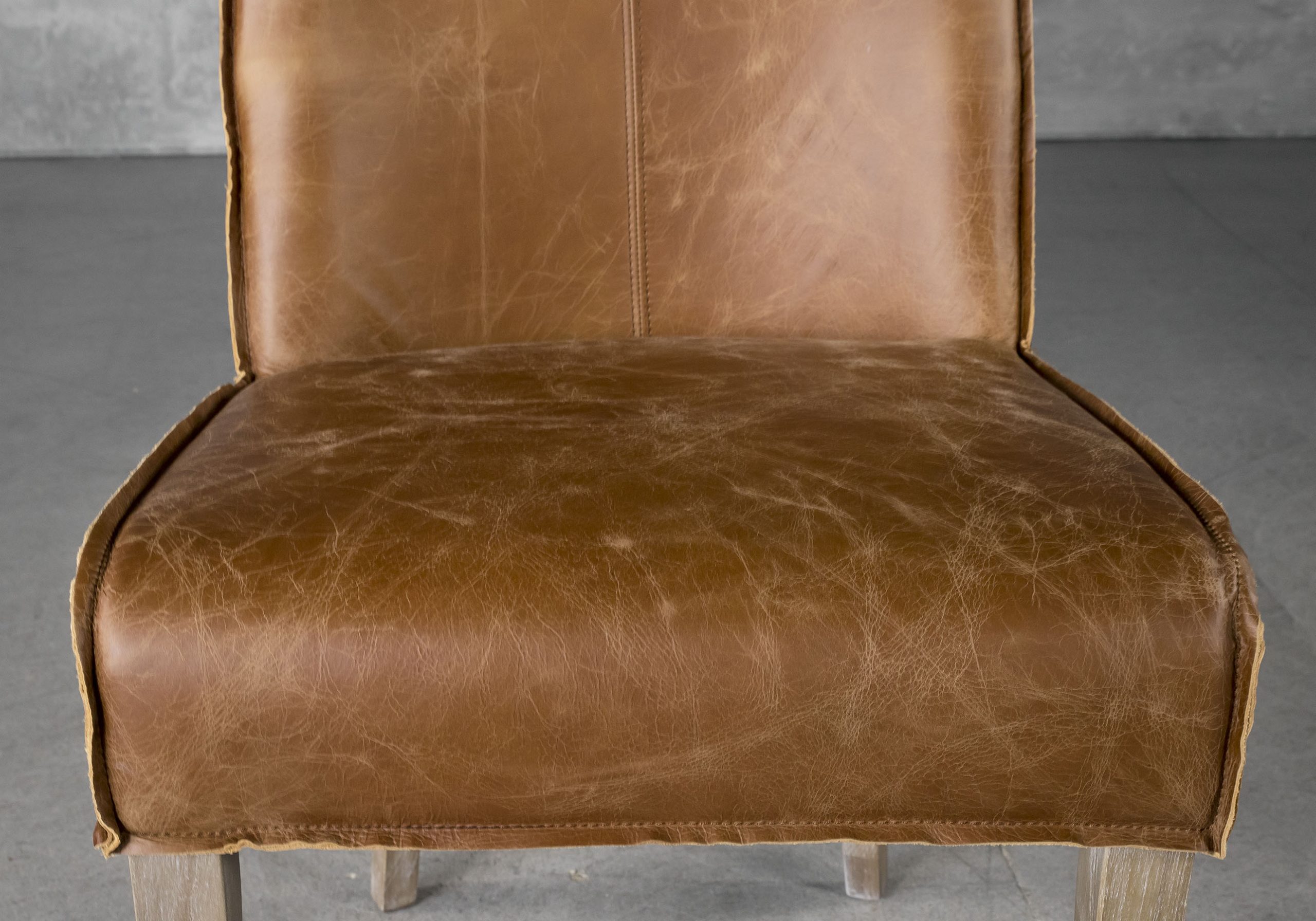 Jonny Tan Leather Dining Chair with Natural Wood Legs | Muse & Merchant
